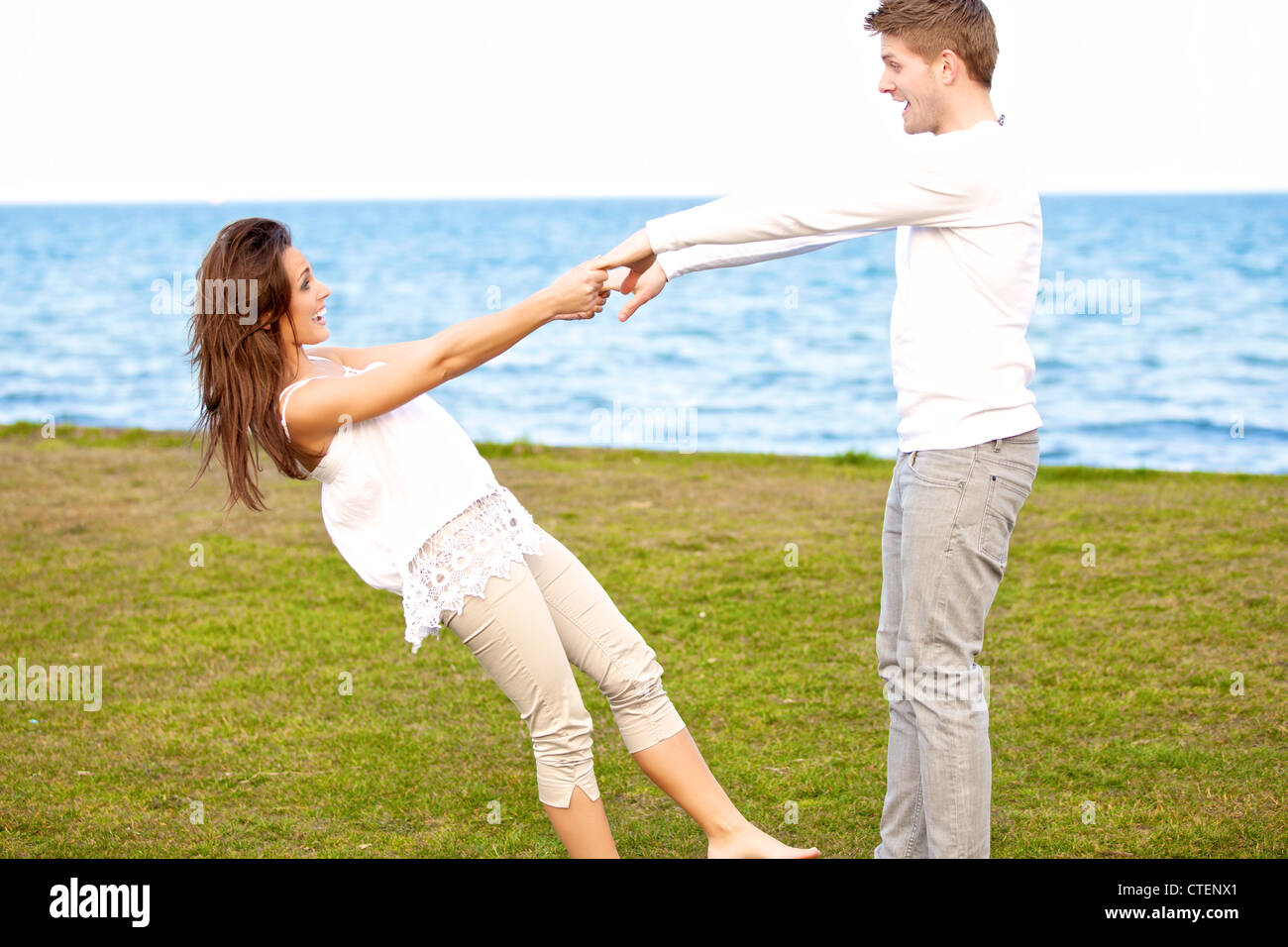 Portrait of a romantic couple dancing Stock Photo - Alamy