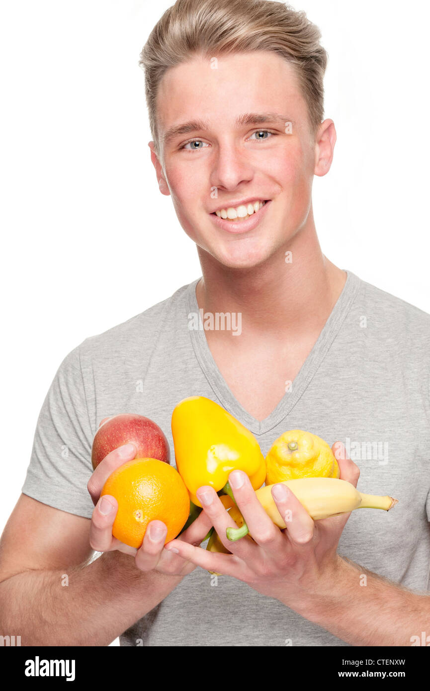 Full isolated studio picture from a happy young man with fruits Stock ...