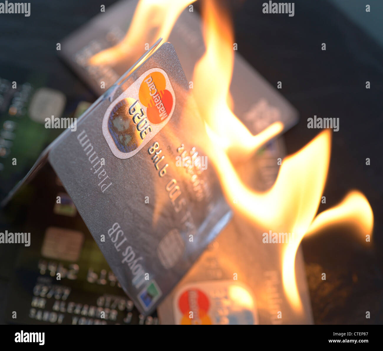 Burning debt hi-res stock photography and images - Alamy