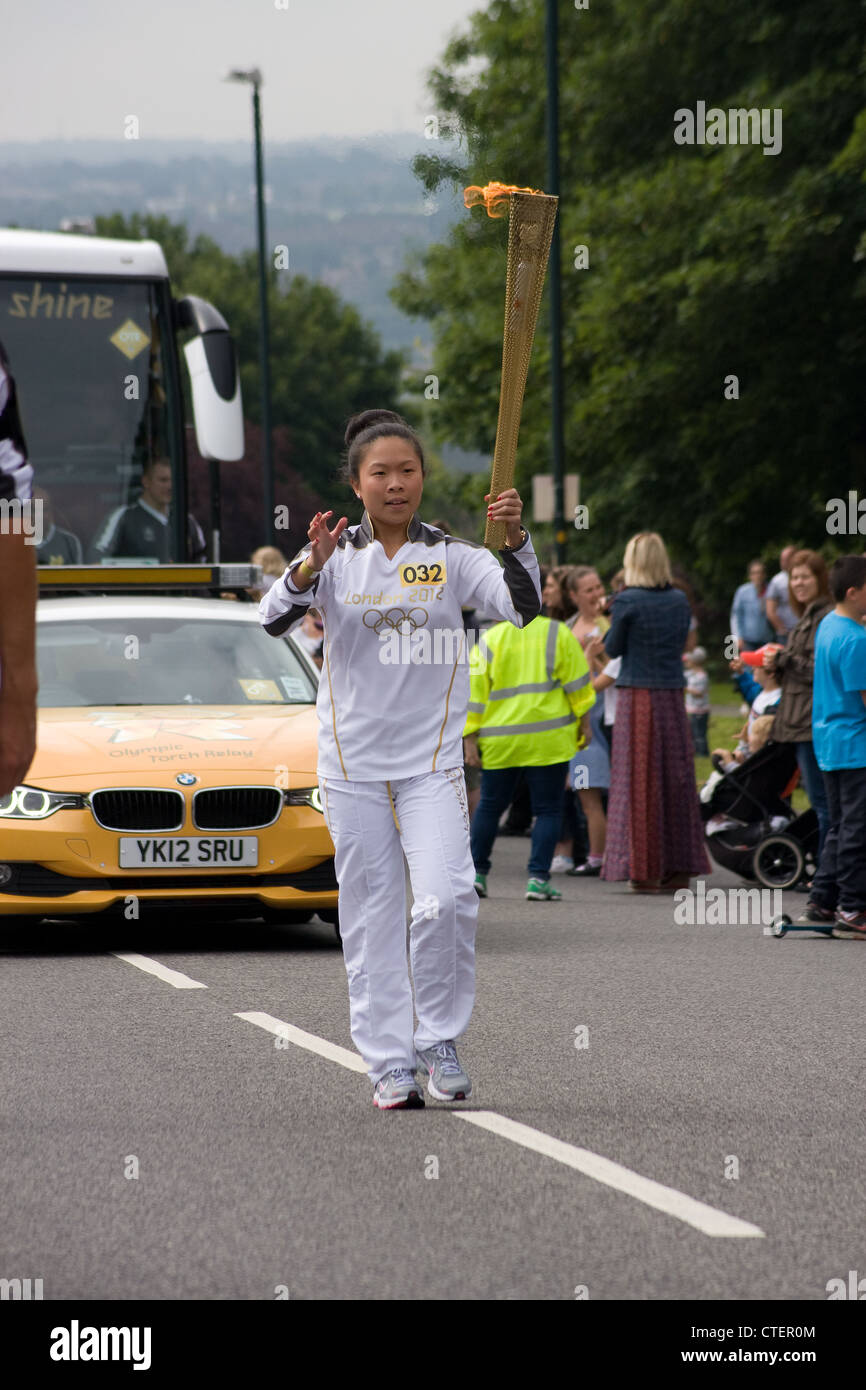 Bearer of the olympic flame hi-res stock photography and images - Alamy