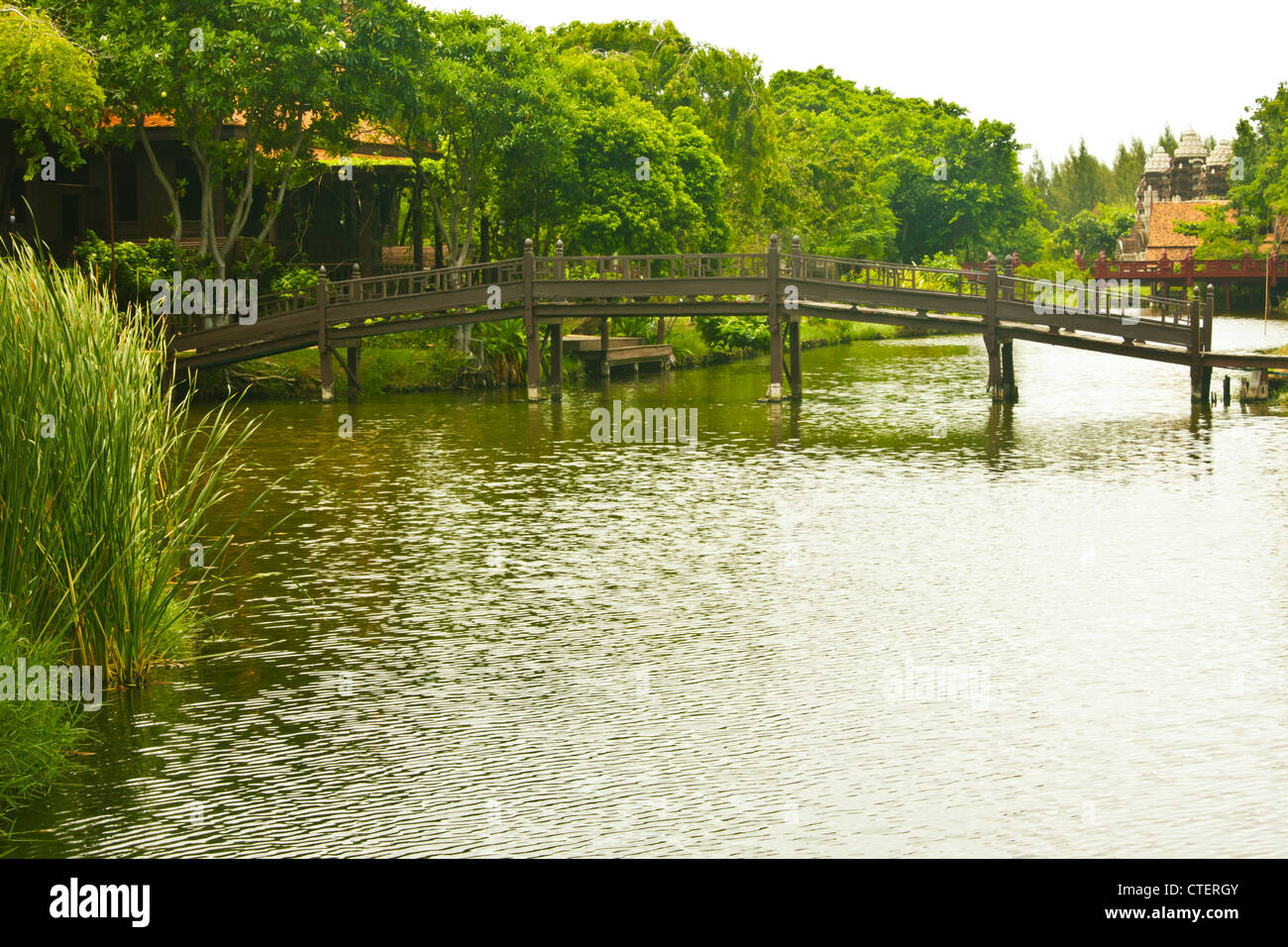 Stock Photo - Nice old wooden bridge in park at summertime Stock Photo ...