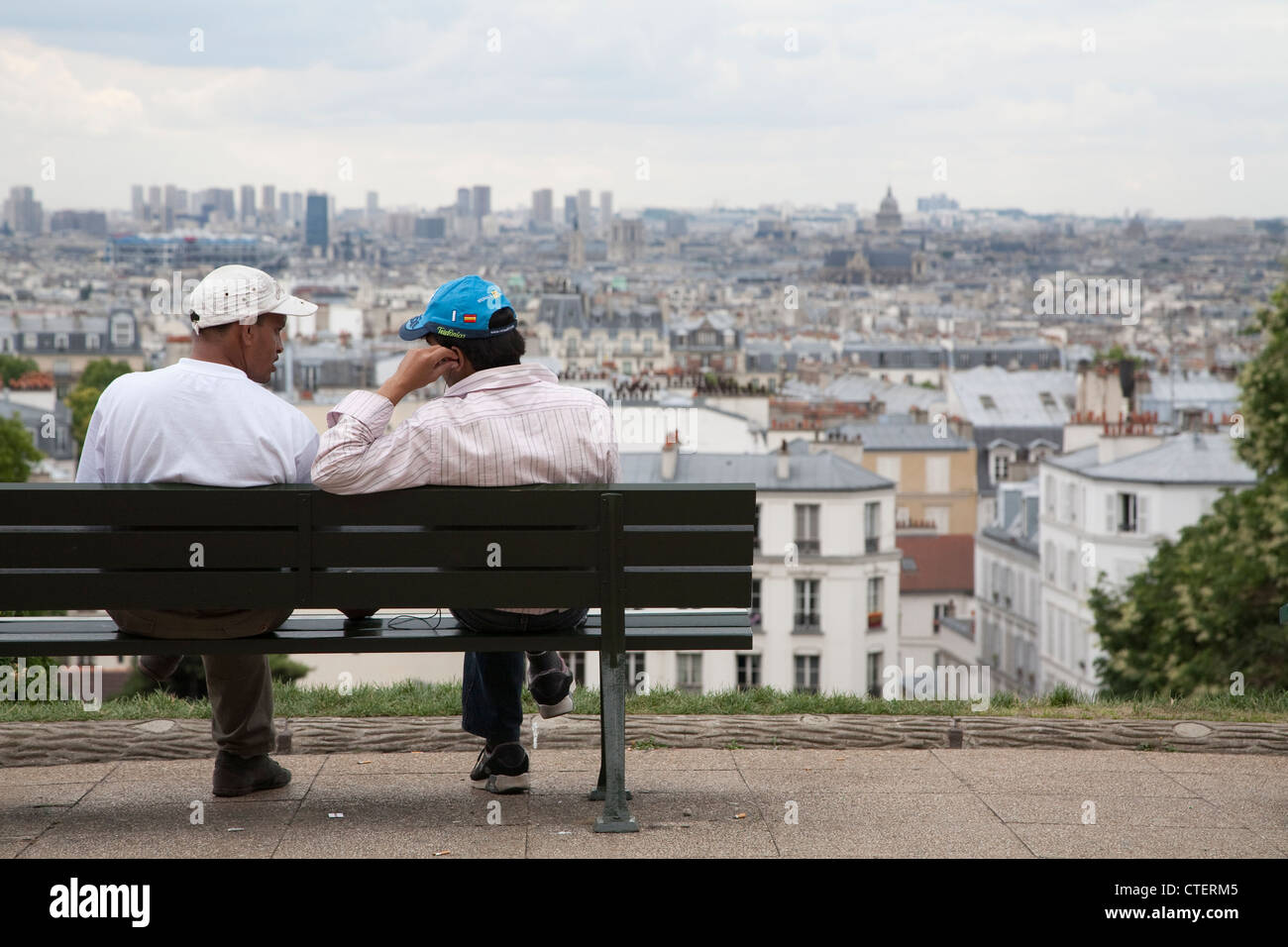 Two men sitting on a bench hi-res stock photography and images - Alamy