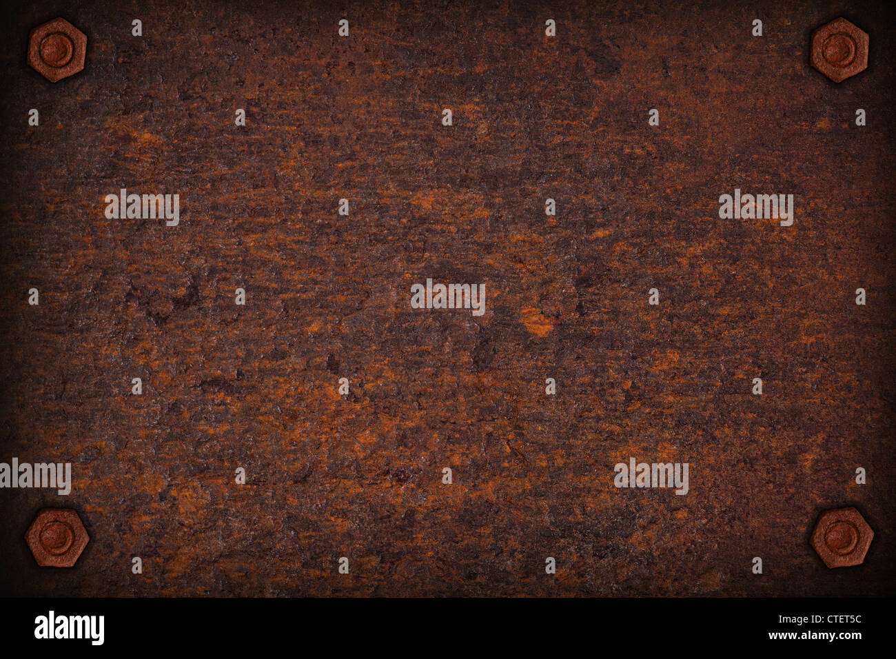rust plate background with four screws in corners Stock Photo - Alamy