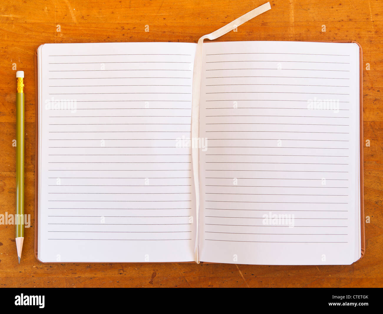 Close up of blank, open notebook, studio shot Stock Photo - Alamy