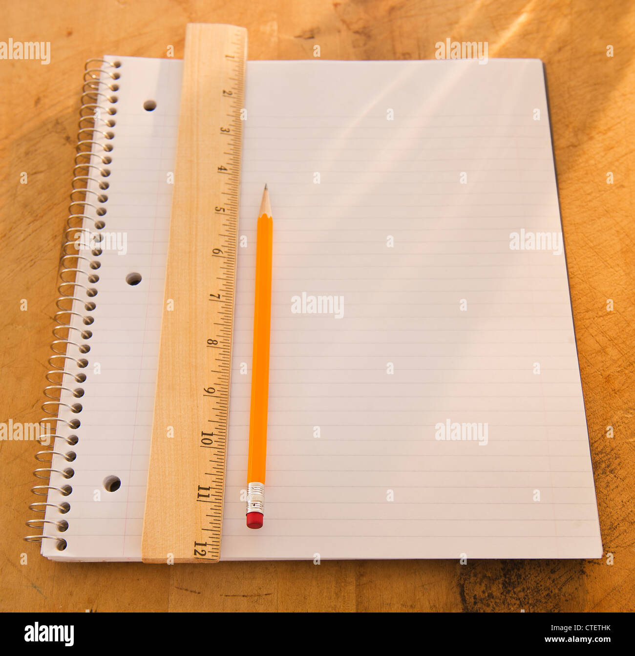 Close up of notebook, ruler and pencil, studio shot Stock Photo - Alamy