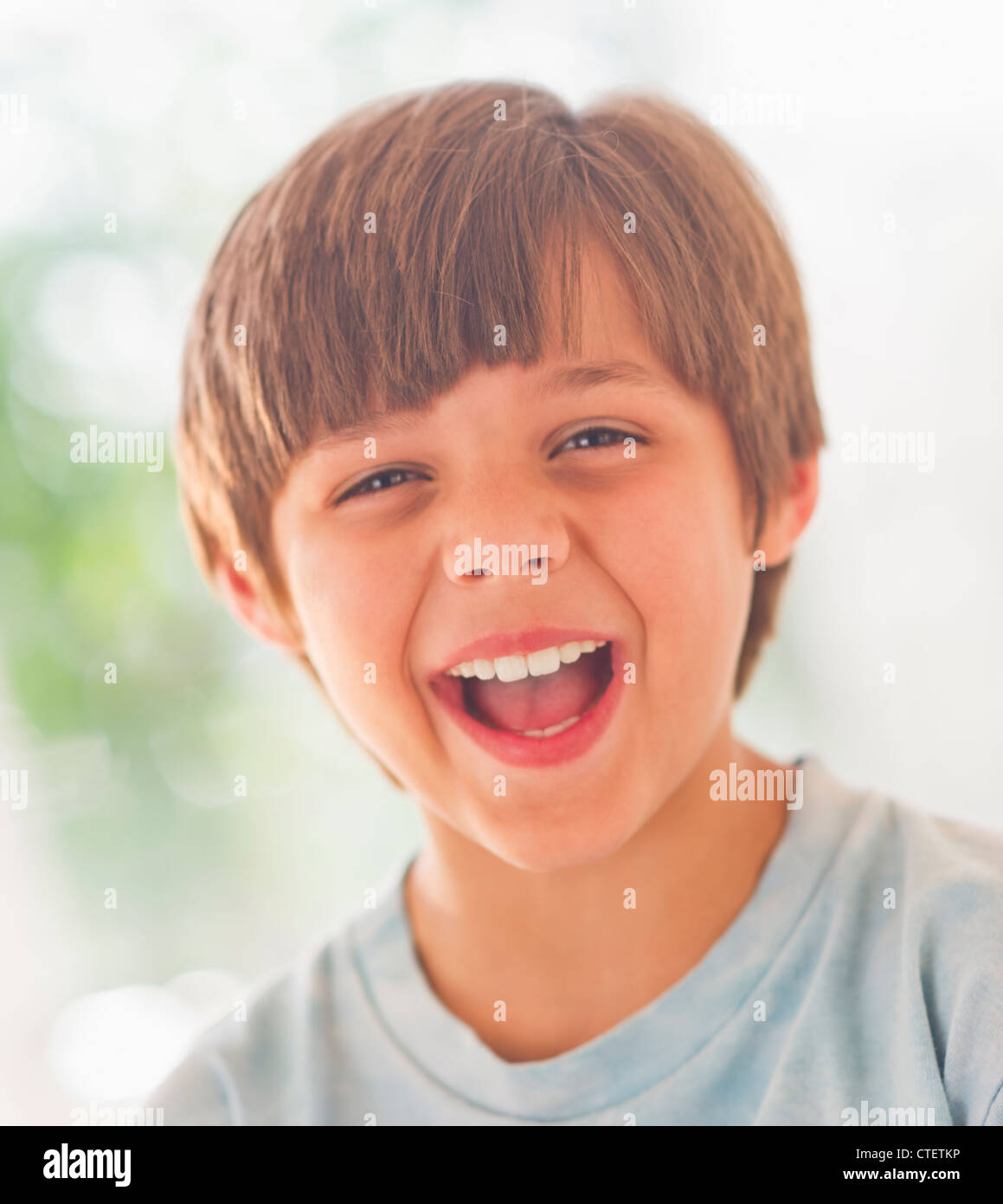 USA, New Jersey, Jersey City, Portrait of laughing boy (10-11 years ...