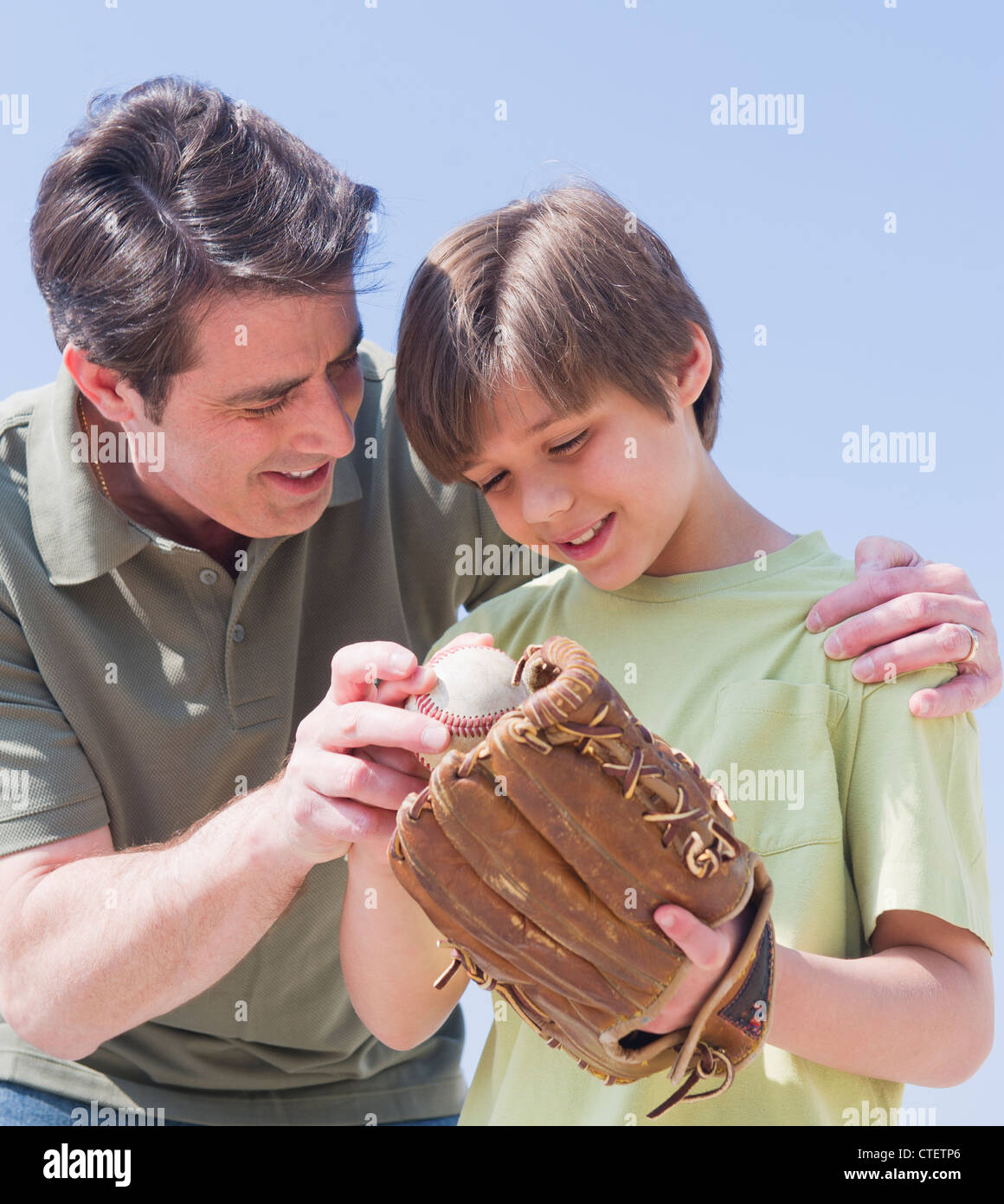 Teaching kids to play baseball hi-res stock photography and images - Alamy