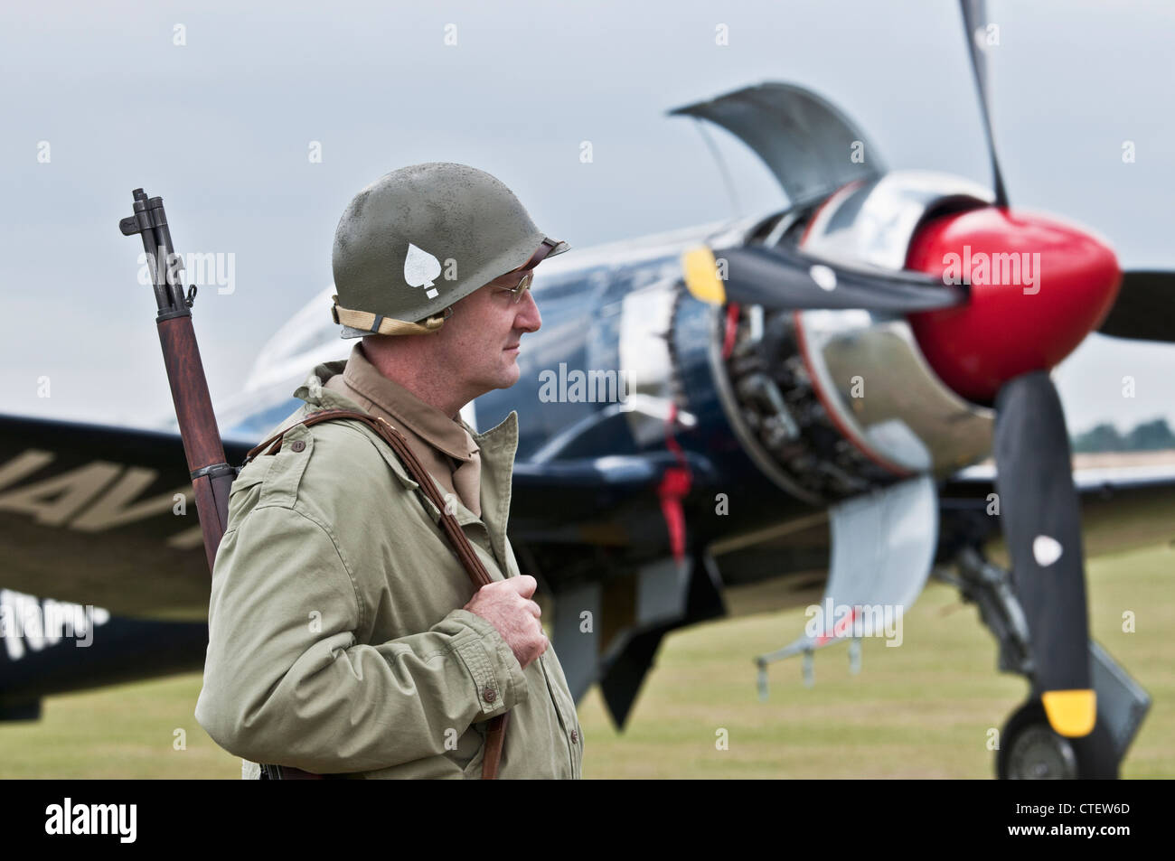 Fancy dress US Soldier in front of a Hawker Sea Fury at the Flying ...