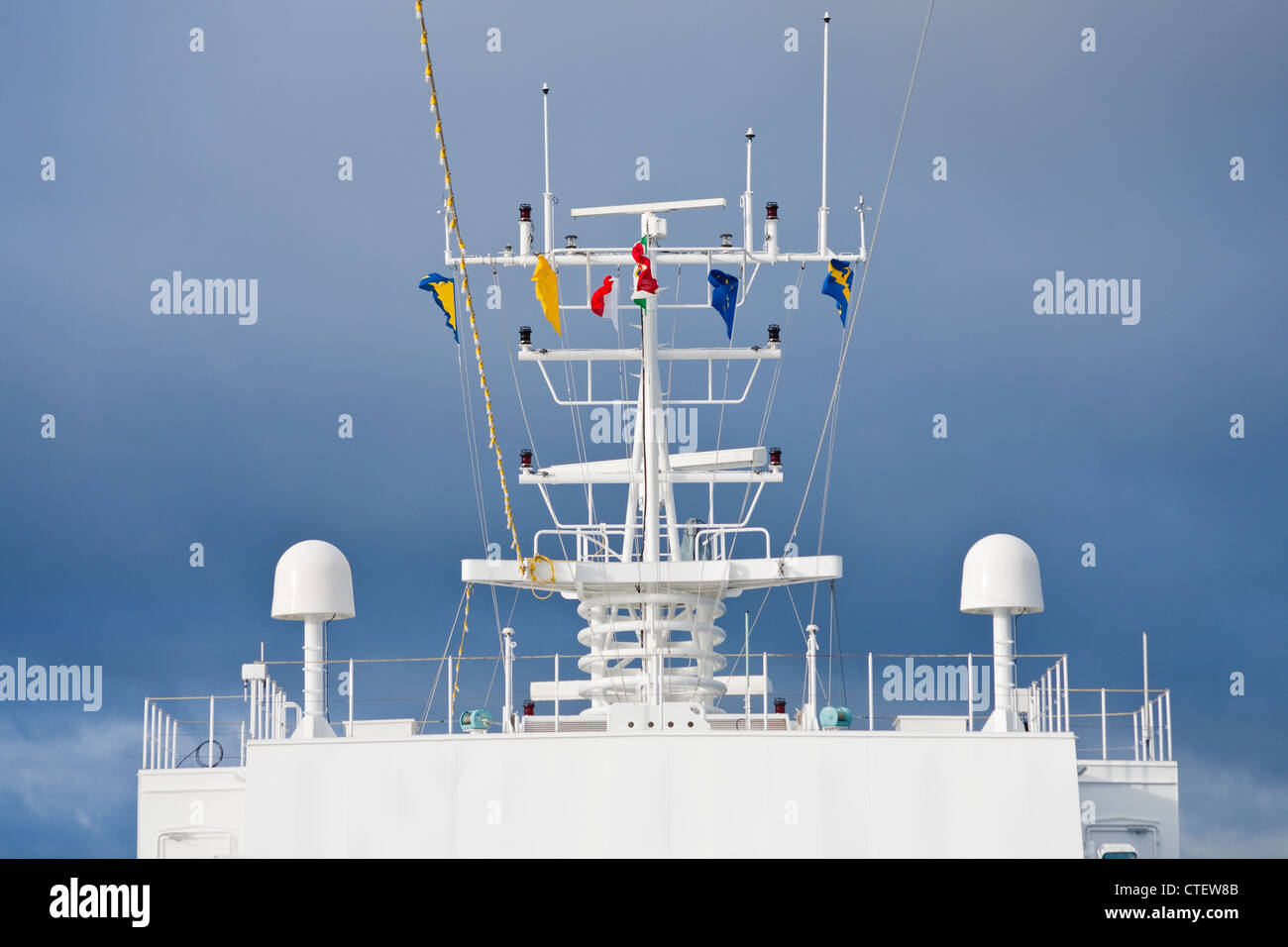 flags of european countries on navigation antenna of cruise liner Stock ...