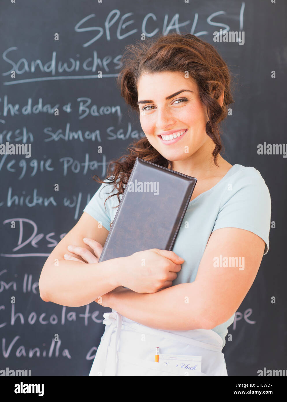 Woman waitress back view hi-res stock photography and images - Alamy