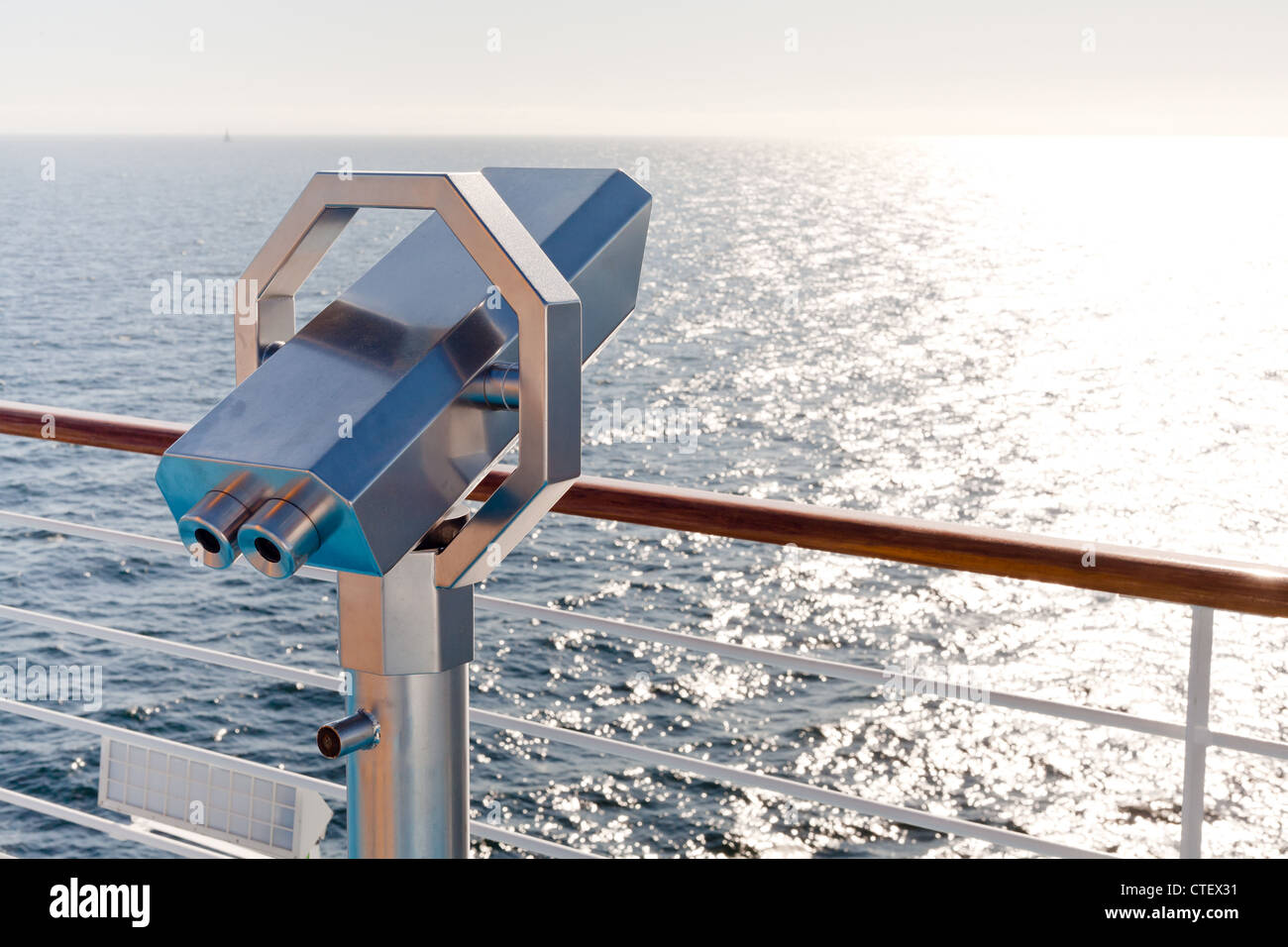 terrestrial telescope on side of cruise liner Stock Photo - Alamy