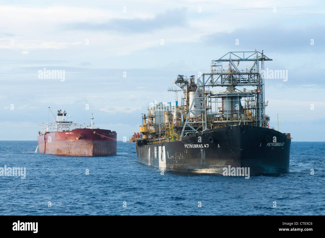 FPSO P47 from Petrobras with oil tanker during offloading operation in ...