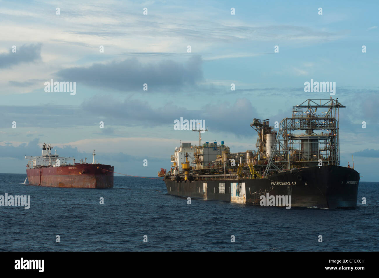 FPSO P47 from Petrobras with oil tanker during offloading operation in ...