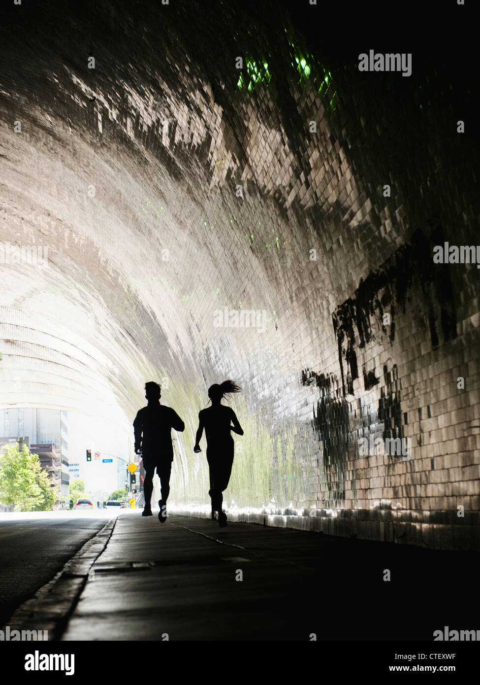 Woman man running silhouette hi-res stock photography and images - Alamy