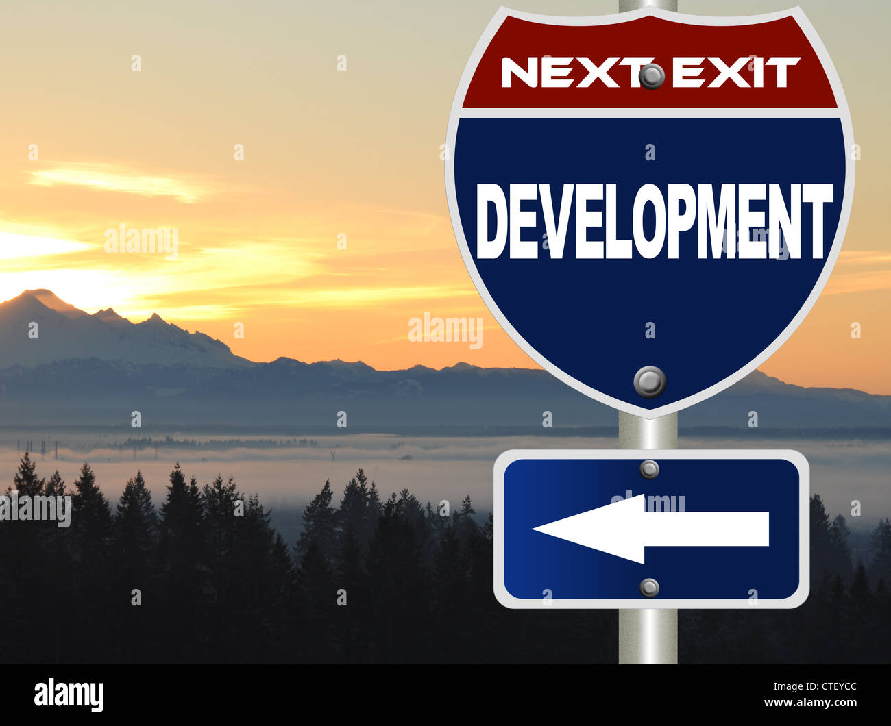 Development road sign Stock Photo - Alamy