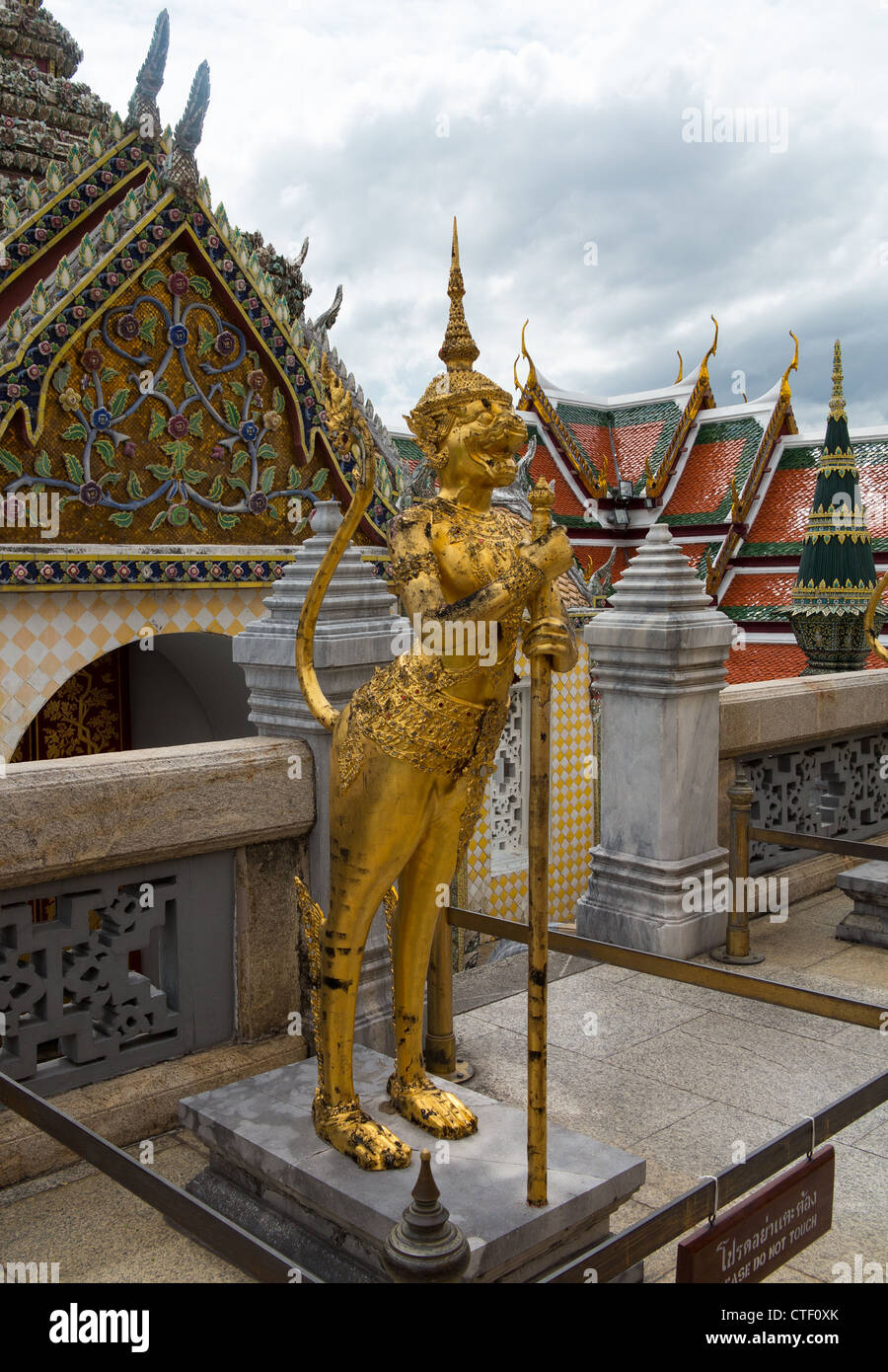 Grand Palace in Bangkok, Thailand with large ornate guard statues Stock ...