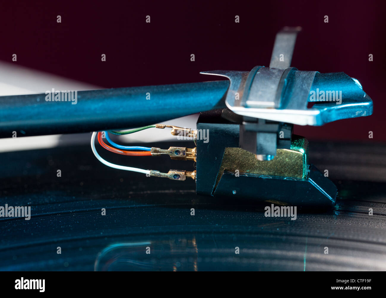 Long Playing record LP on retro record player with tone arm and ...