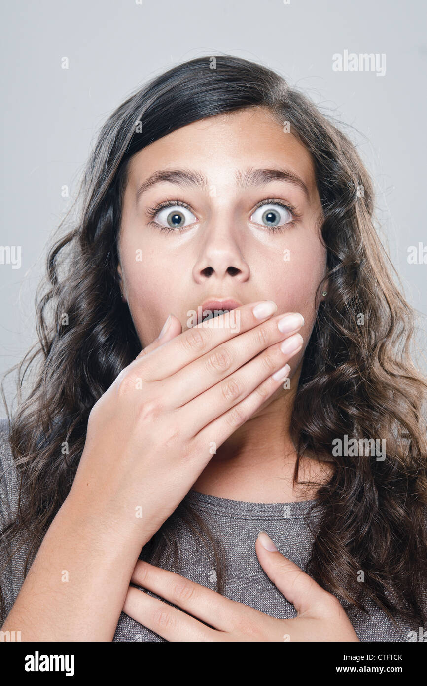 USA, California, Los Angeles, portrait of girl (12-13) expressing fear ...