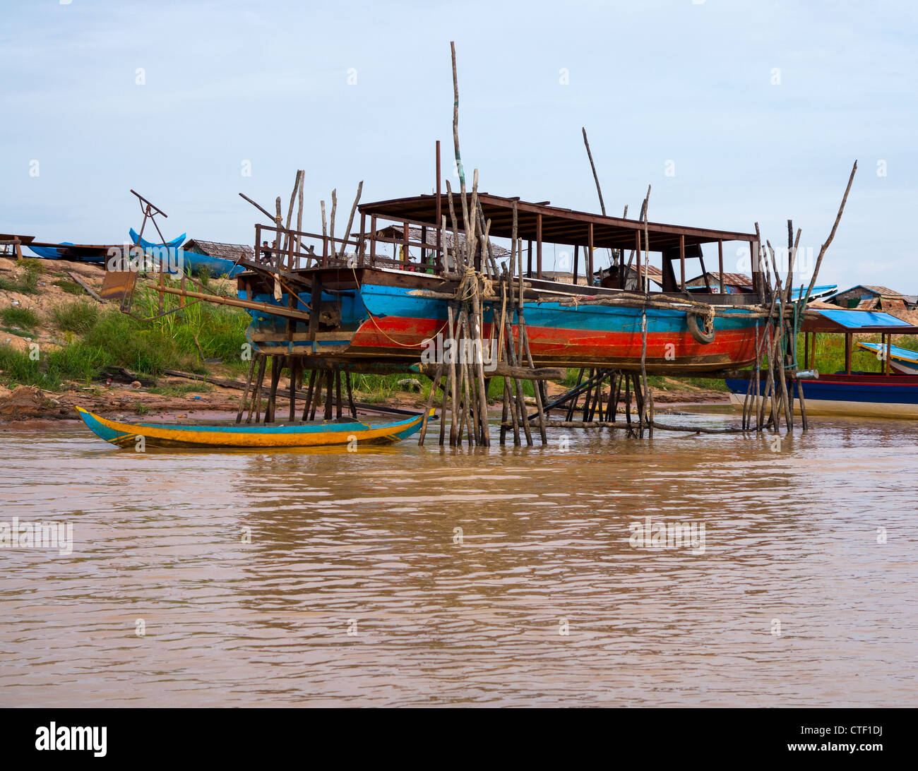Floating village on Lake Tonle Sap in Cambodia with some houses made ...