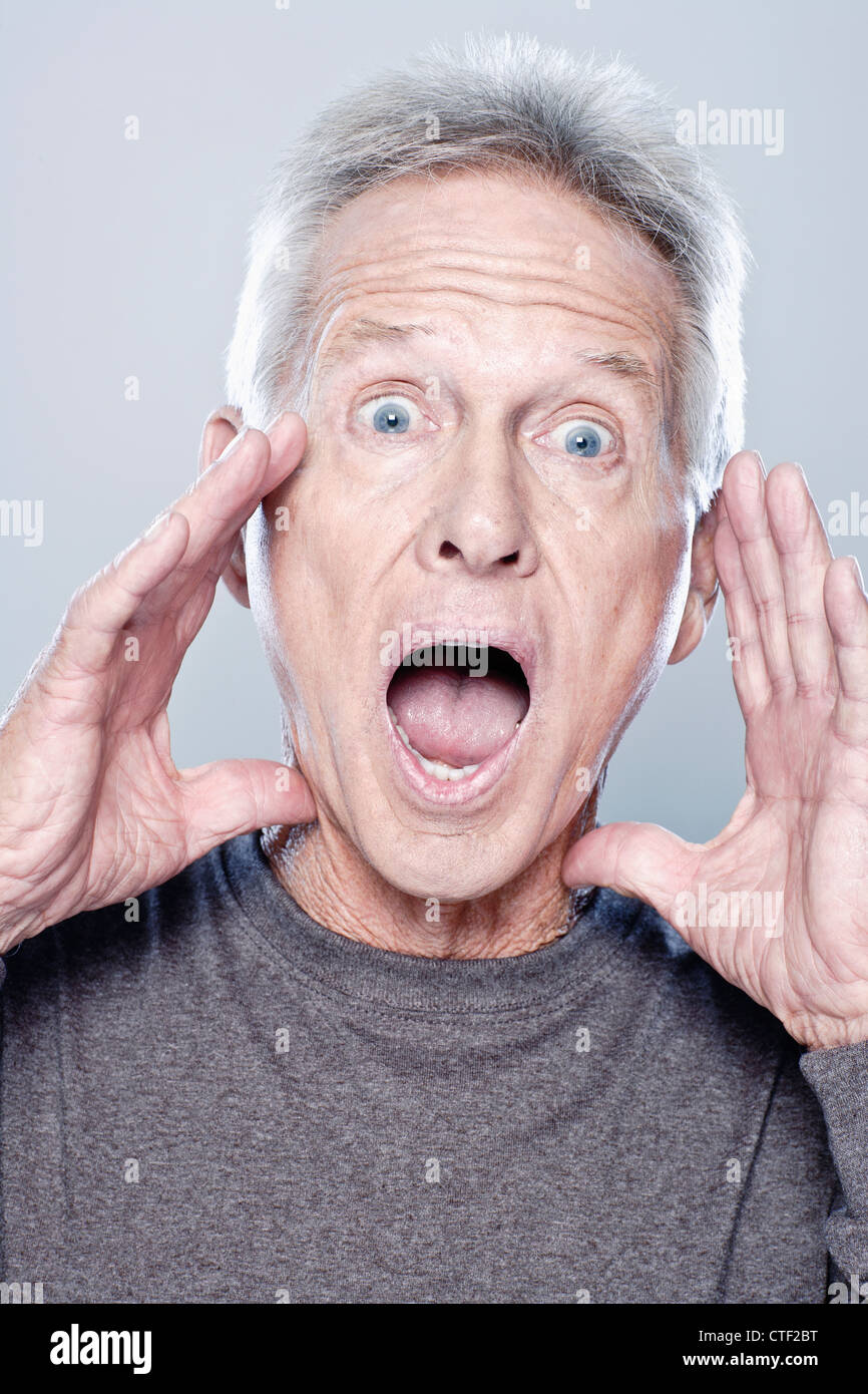Portrait of screaming senior man, studio shot Stock Photo - Alamy