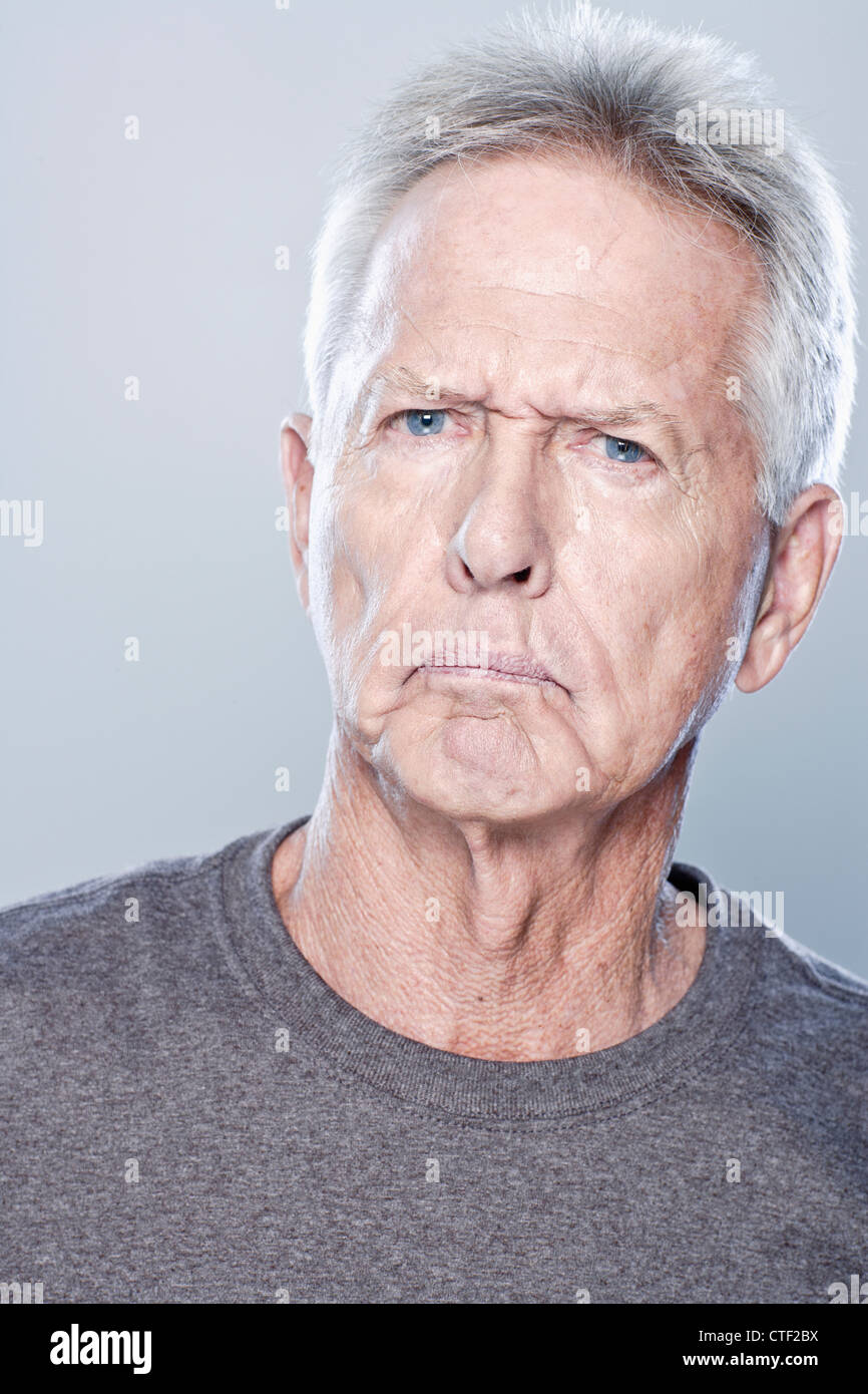 Portrait of angry senior man, studio shot Stock Photo - Alamy