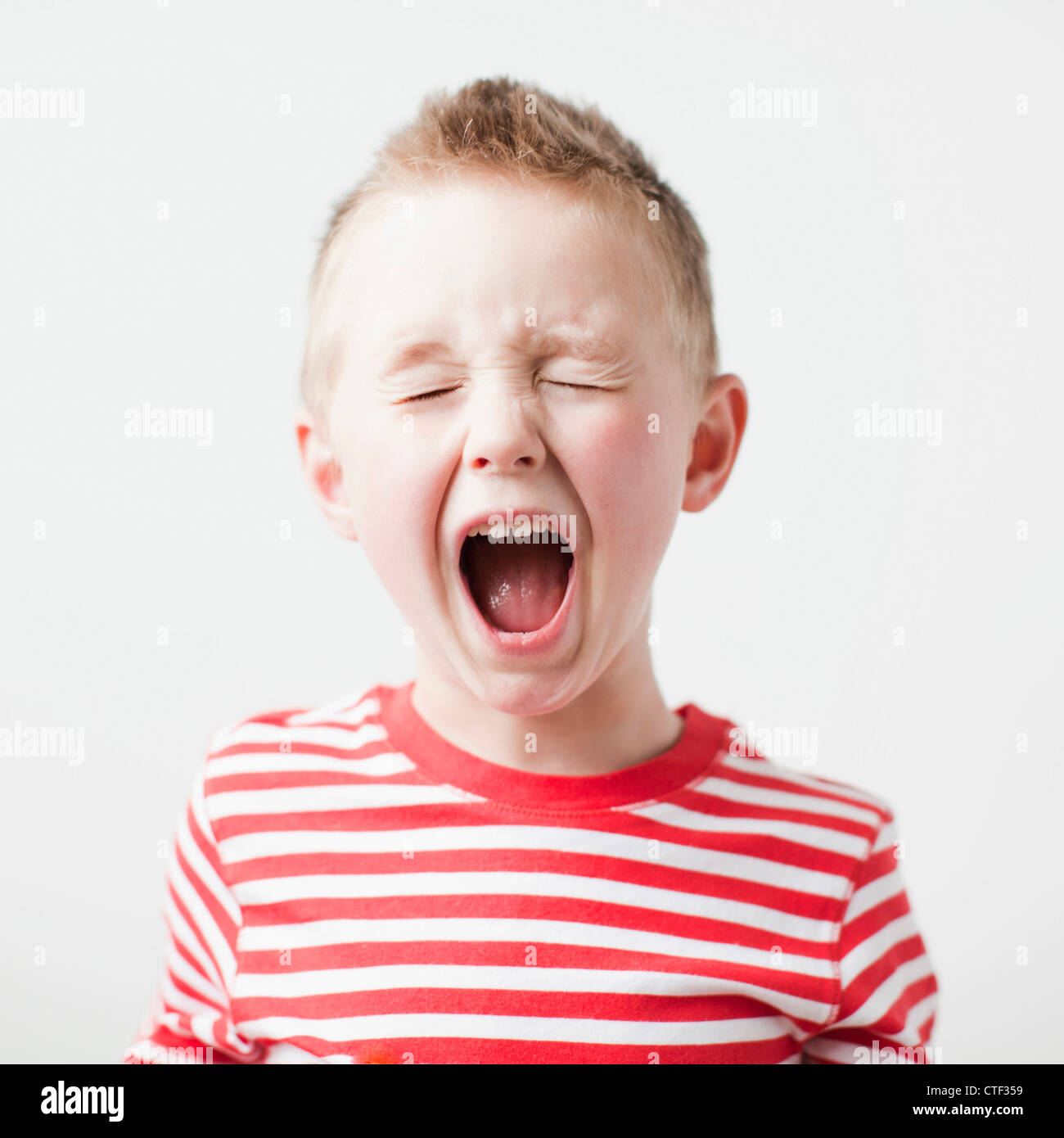 Portrait of male toddler (2-3) yawning Stock Photo - Alamy