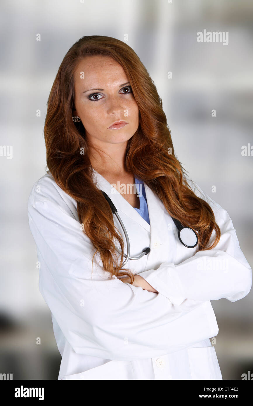 Young female doctor working in a hospital Stock Photo - Alamy