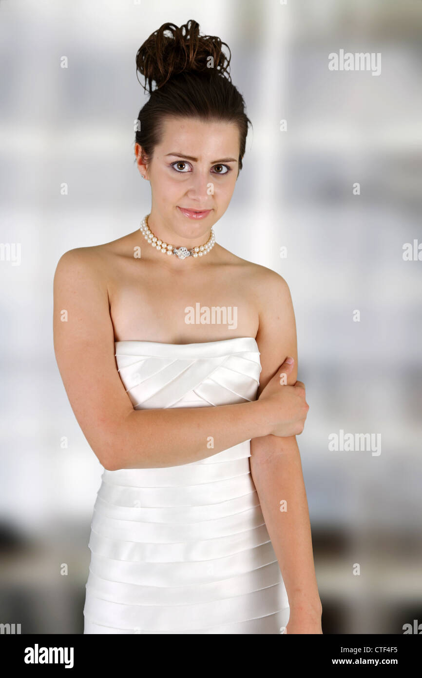 Woman in a wedding dress getting ready Stock Photo - Alamy