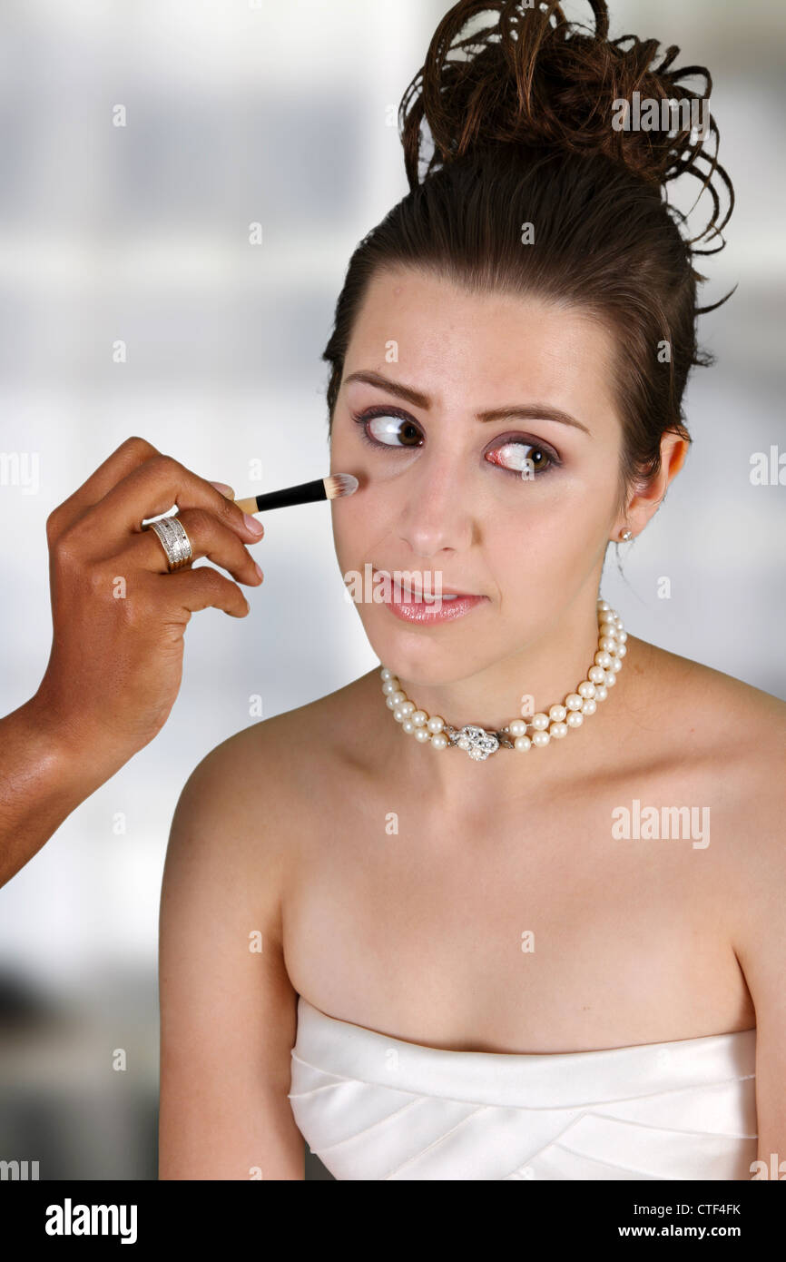 Woman in a wedding dress getting ready Stock Photo - Alamy