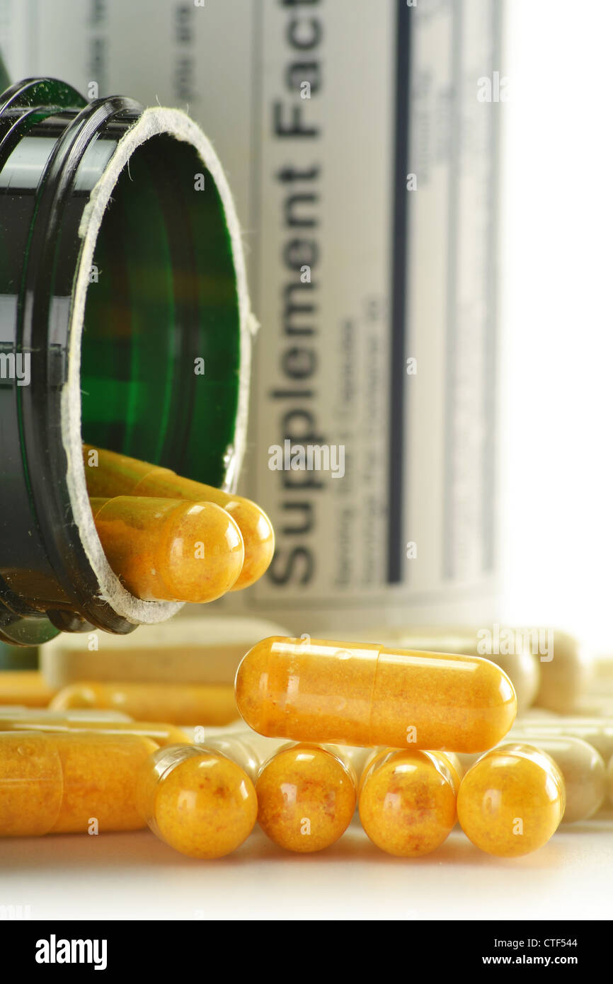 Composition with dietary supplement capsules and containers. Variety of ...
