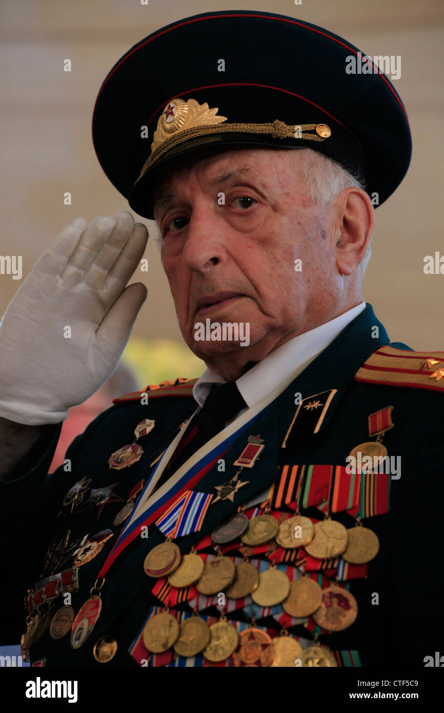 A soviet Jewish World War II veteran with medals pinned in his old ...