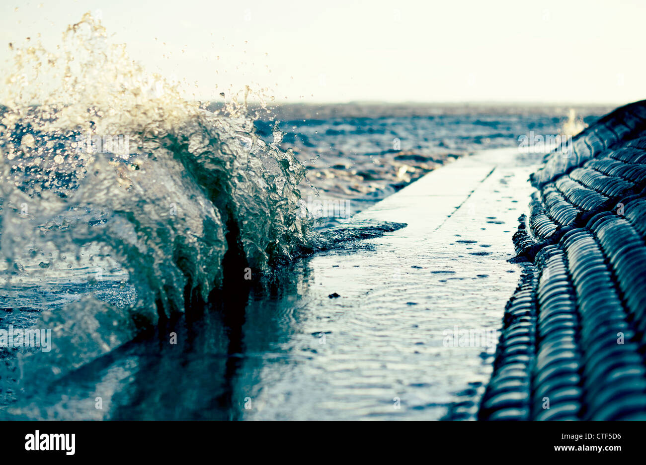 Waves over wall hi-res stock photography and images - Alamy