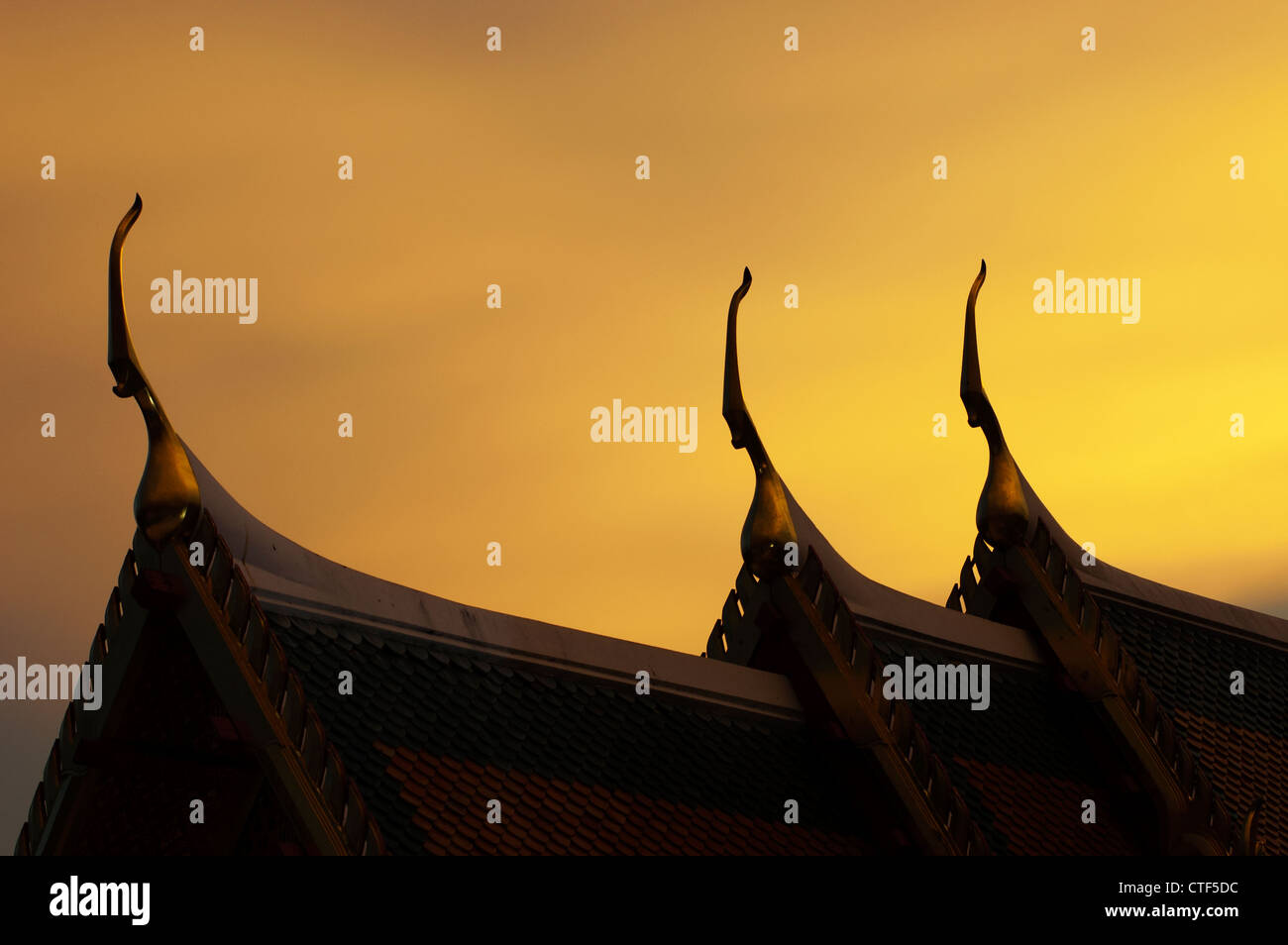 Silhouette of the roof of a temple during sunset Stock Photo - Alamy