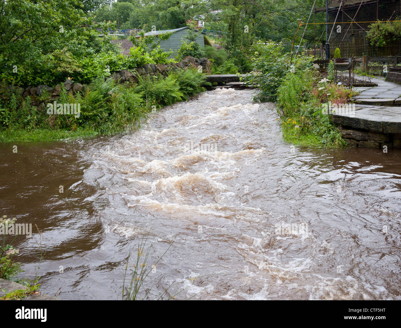River Tame in flood, Delph village, Saddleworth, Greater Manchester,UK ...