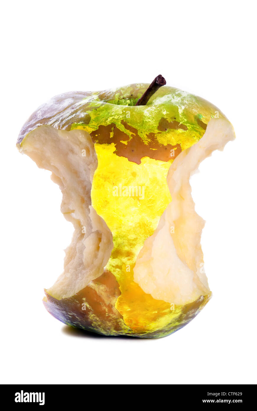 a bitten apple as world symbol before white background Stock Photo - Alamy