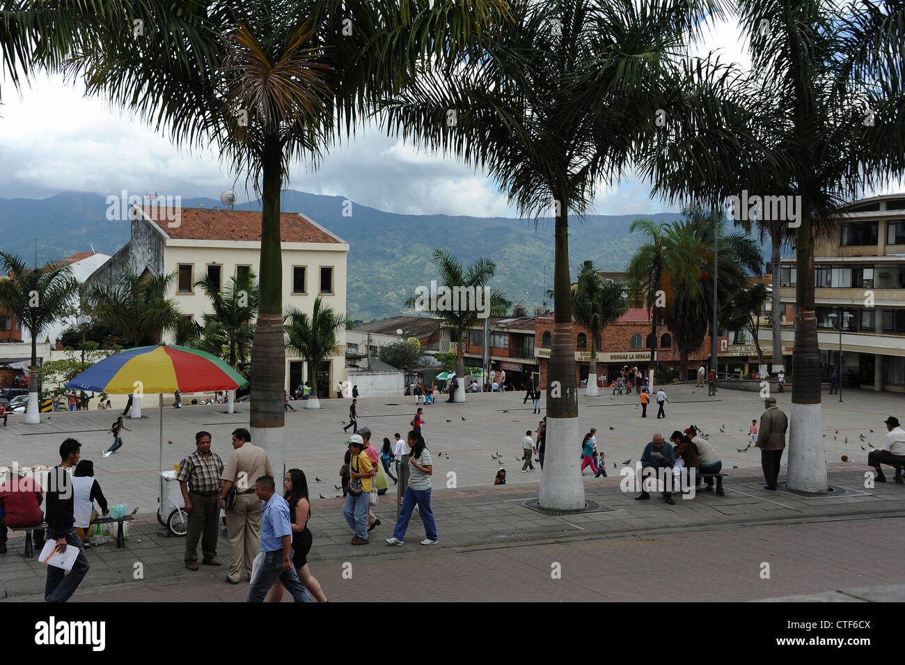 Colombians walking in Plaza Mayor the main square town of Fusagasuga ...