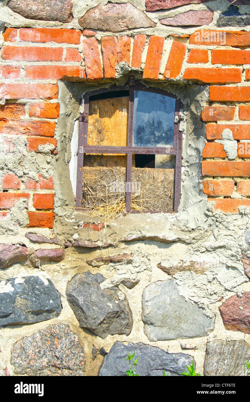 Detail of old house wall with damaged window Stock Photo - Alamy