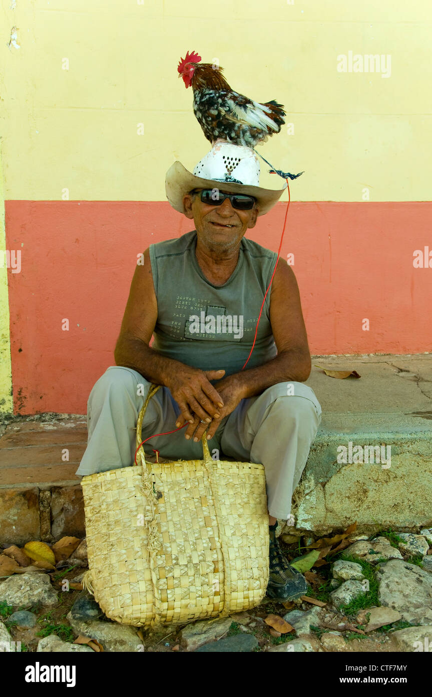 Man with rooster hi-res stock photography and images - Alamy