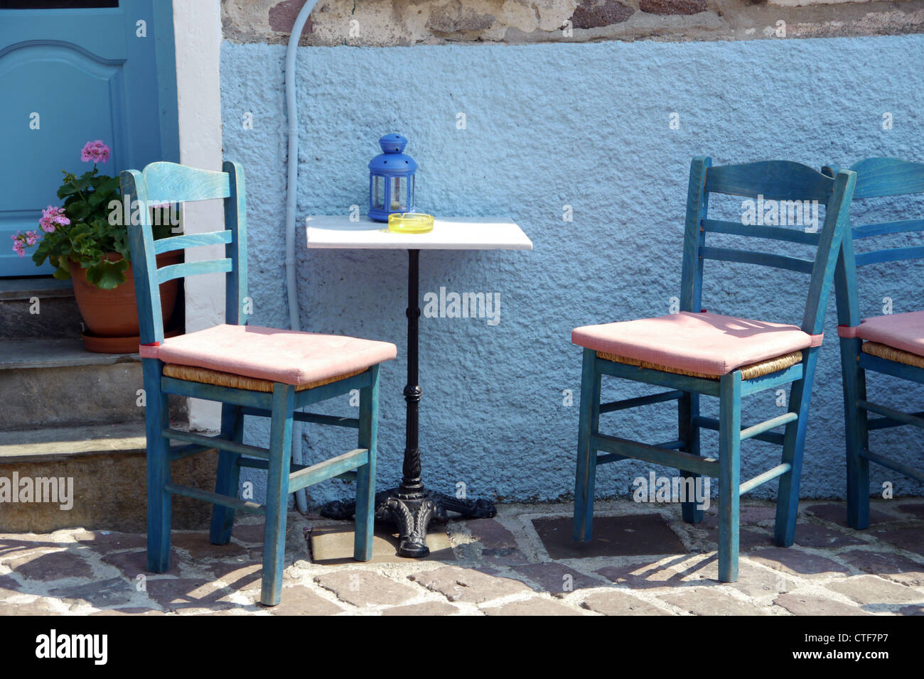 Greek blue table and chairs hi-res stock photography and images - Alamy
