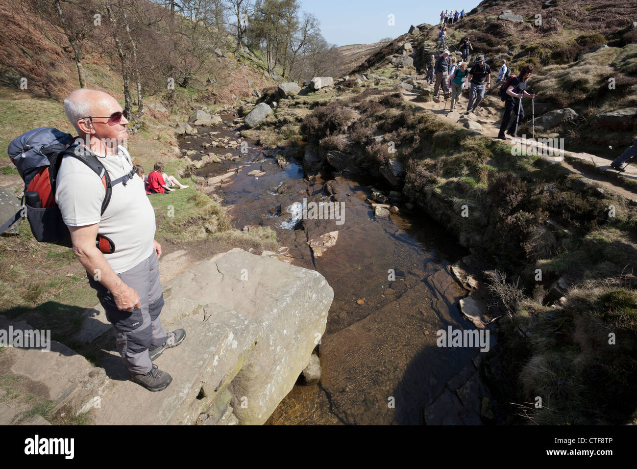 Walkers at Bronte Bridge on The Bronte way outside Haworth Stock Photo ...