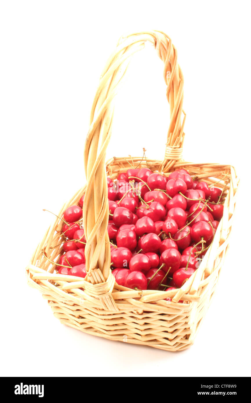 Wicker basket, inside red cherries Stock Photo - Alamy