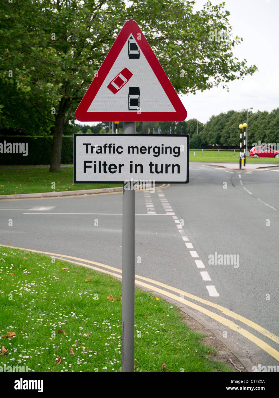 Road warning signs advising driver that traffic merges ahead Stock ...