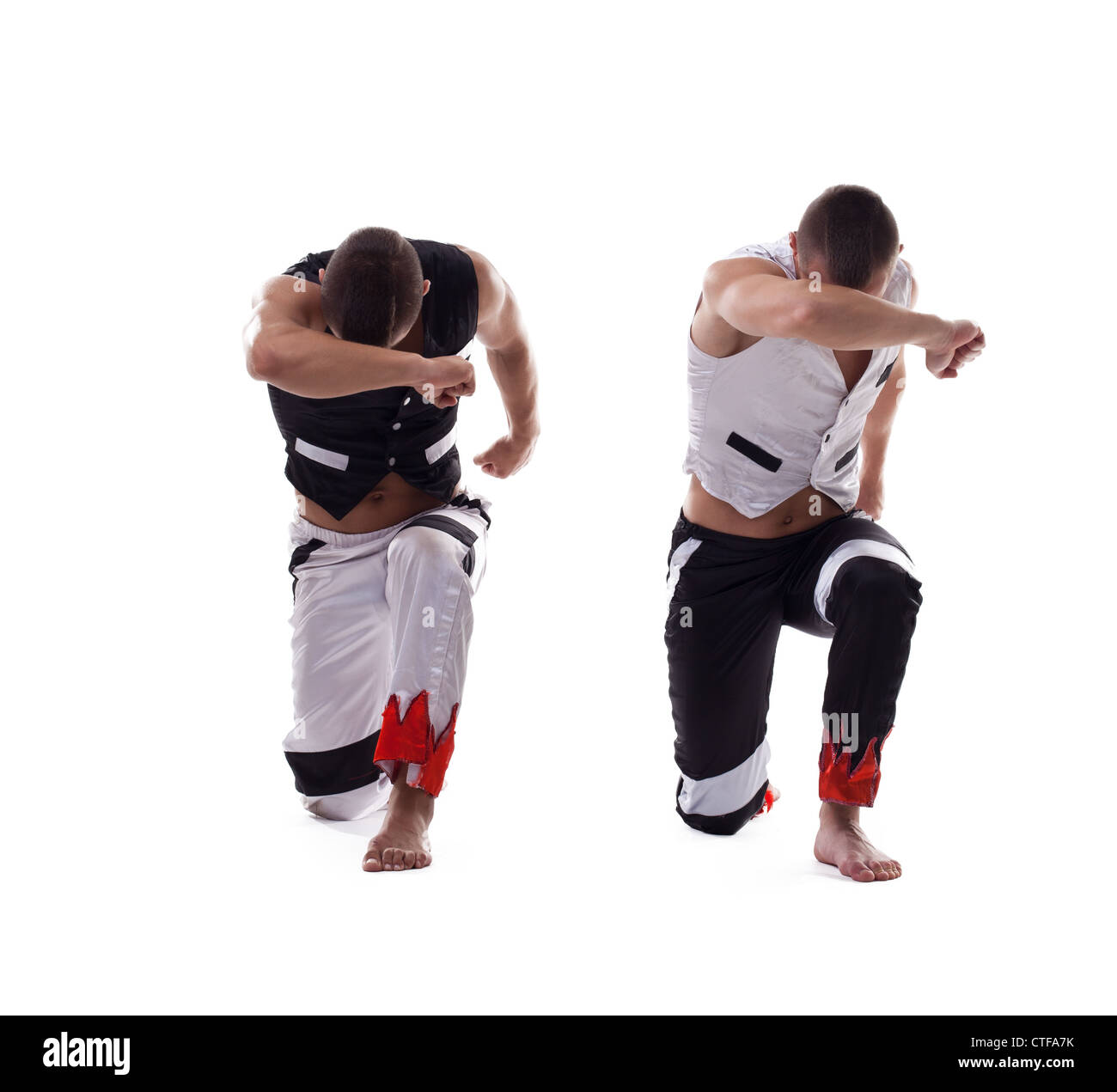 two strong men show dance performance isolated Stock Photo - Alamy