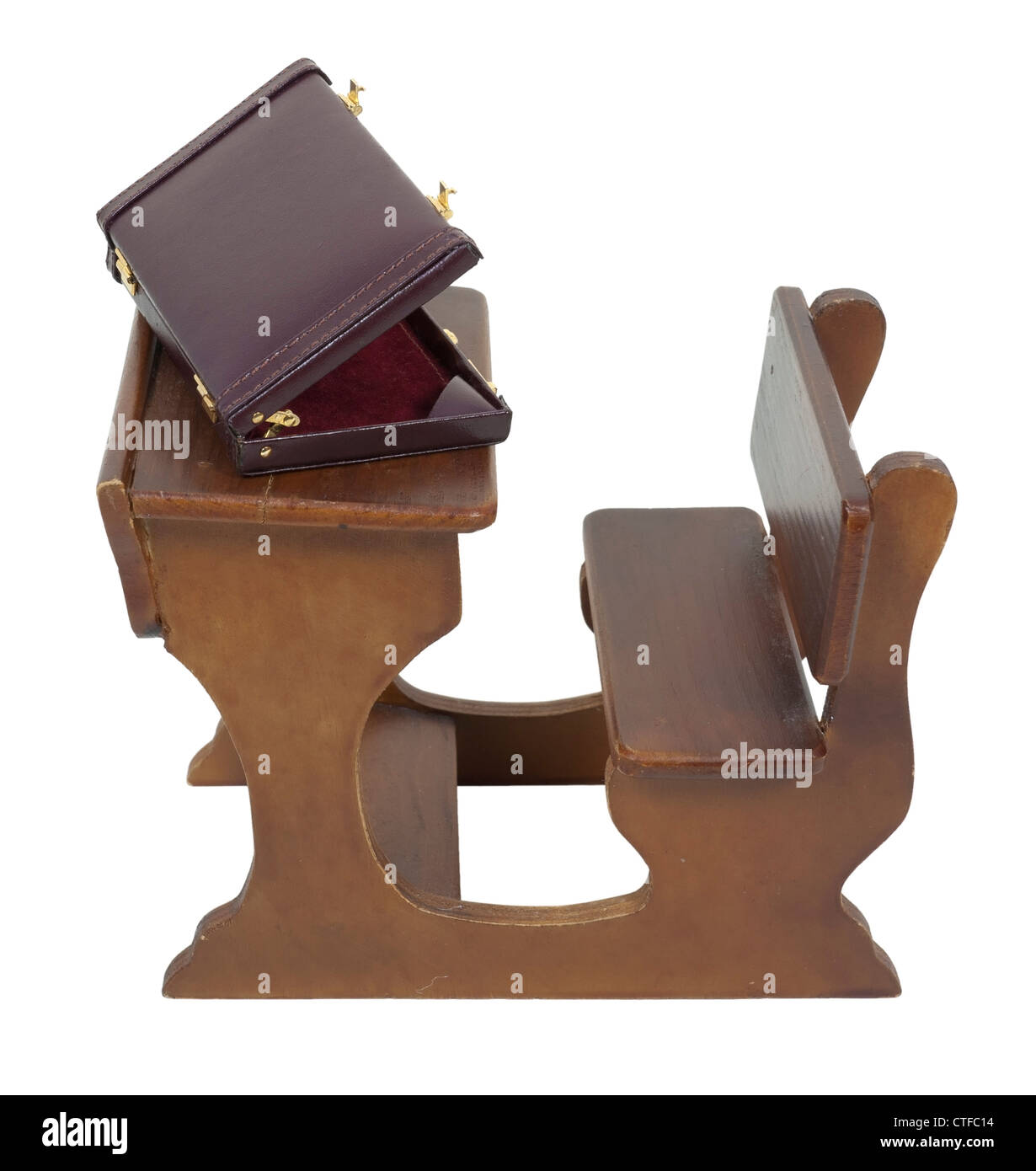 Briefcase on retro wooden student desk - path included Stock Photo - Alamy