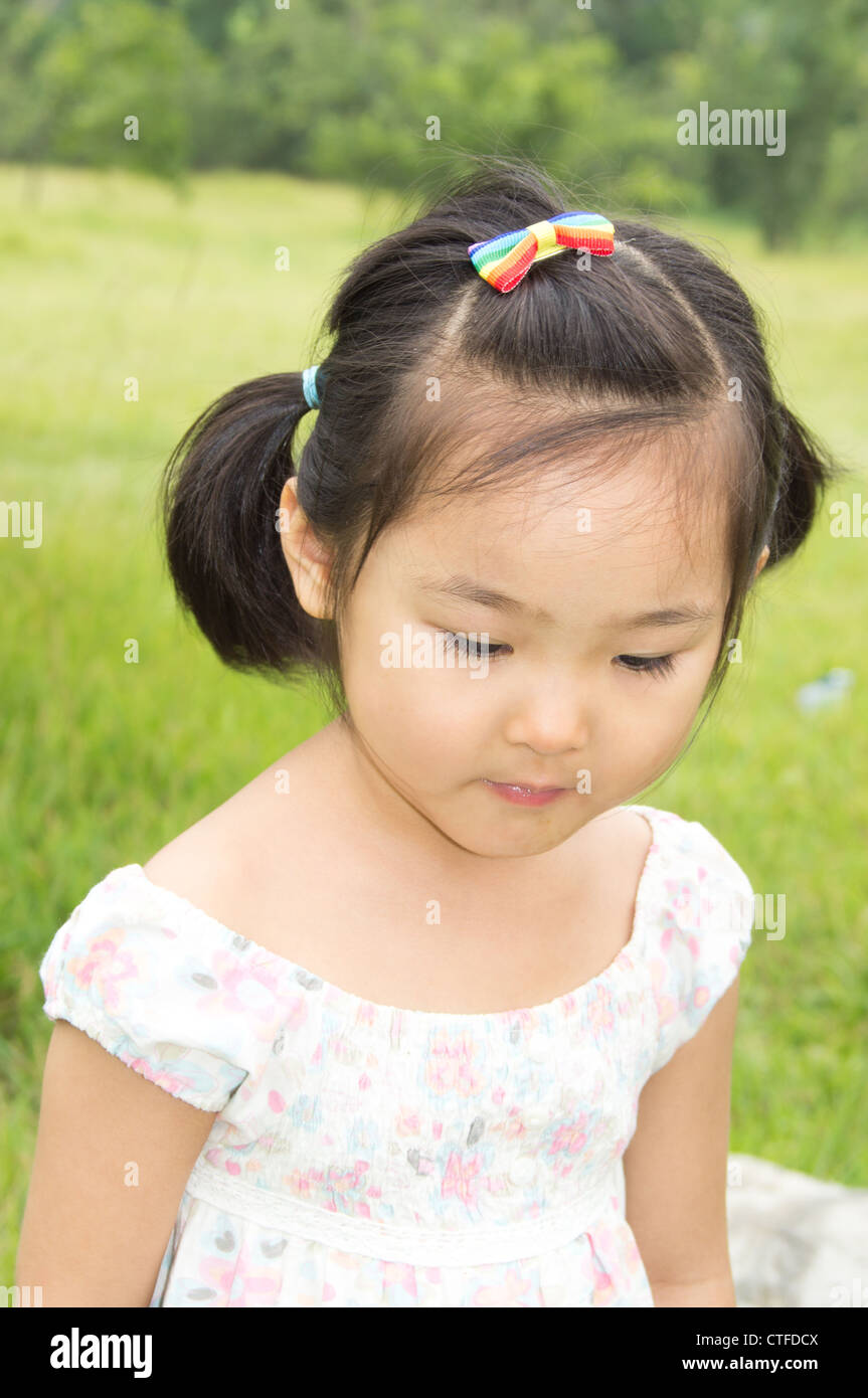 Cute little girl in Asia Stock Photo - Alamy
