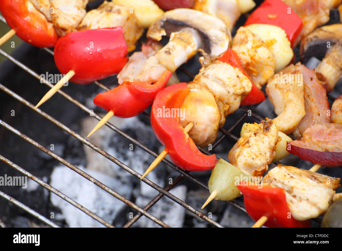 Barbecue with delicious grilled meat on grill BBQ Stock Photo - Alamy