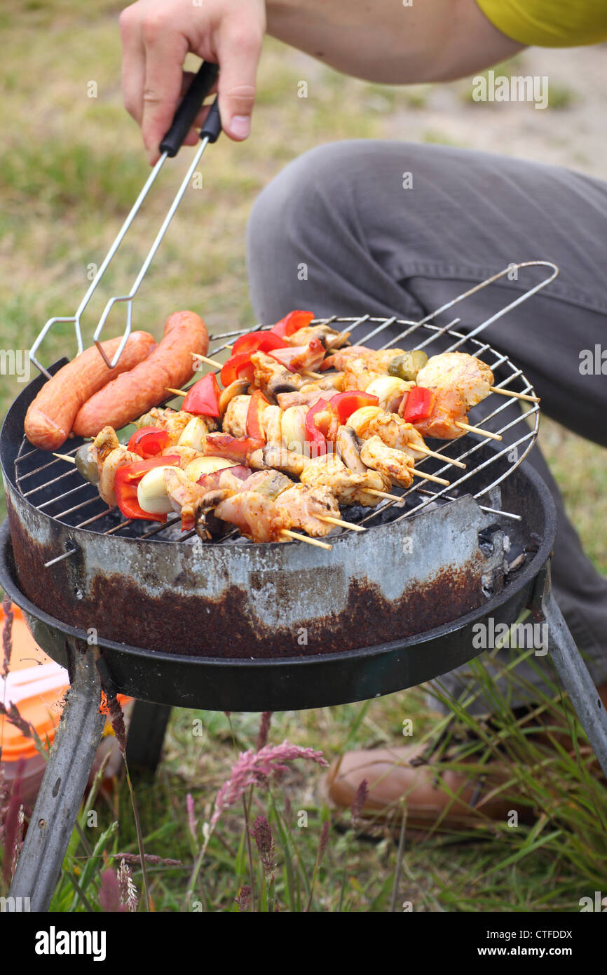 Barbecue with delicious grilled meat on grill BBQ Stock Photo - Alamy