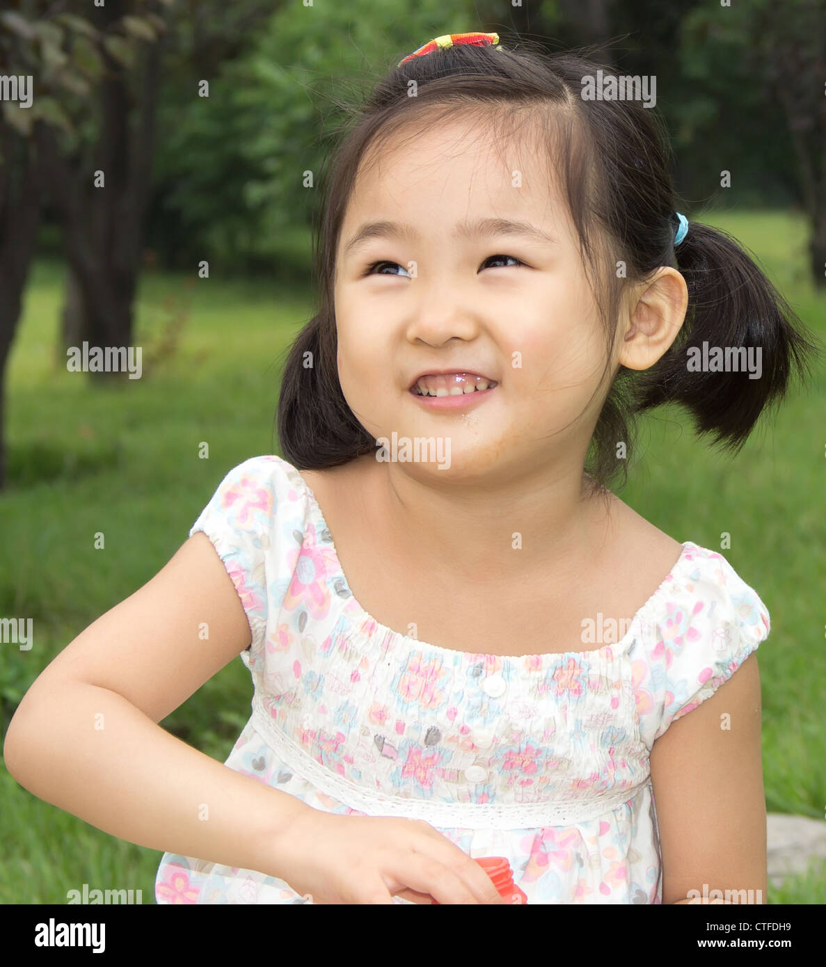 Cute little girl in Asia Stock Photo - Alamy