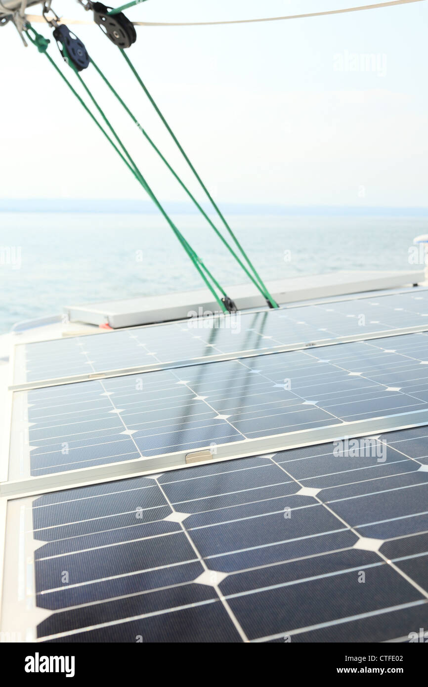 Solar charging batteries aboard a sail boat Photovoltaic panels energy ...