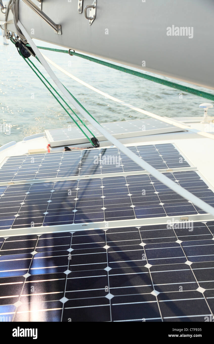 Solar charging batteries aboard a sail boat Photovoltaic panels energy ...